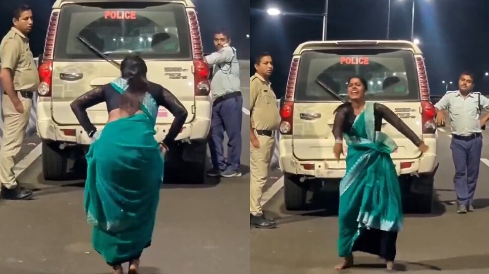 Teen Girl doing reels in front of police officers on middle of the road ...